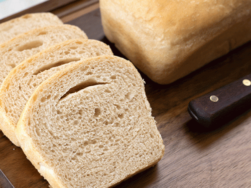 triple-slice-on-cutting-board - Bread by the Hour